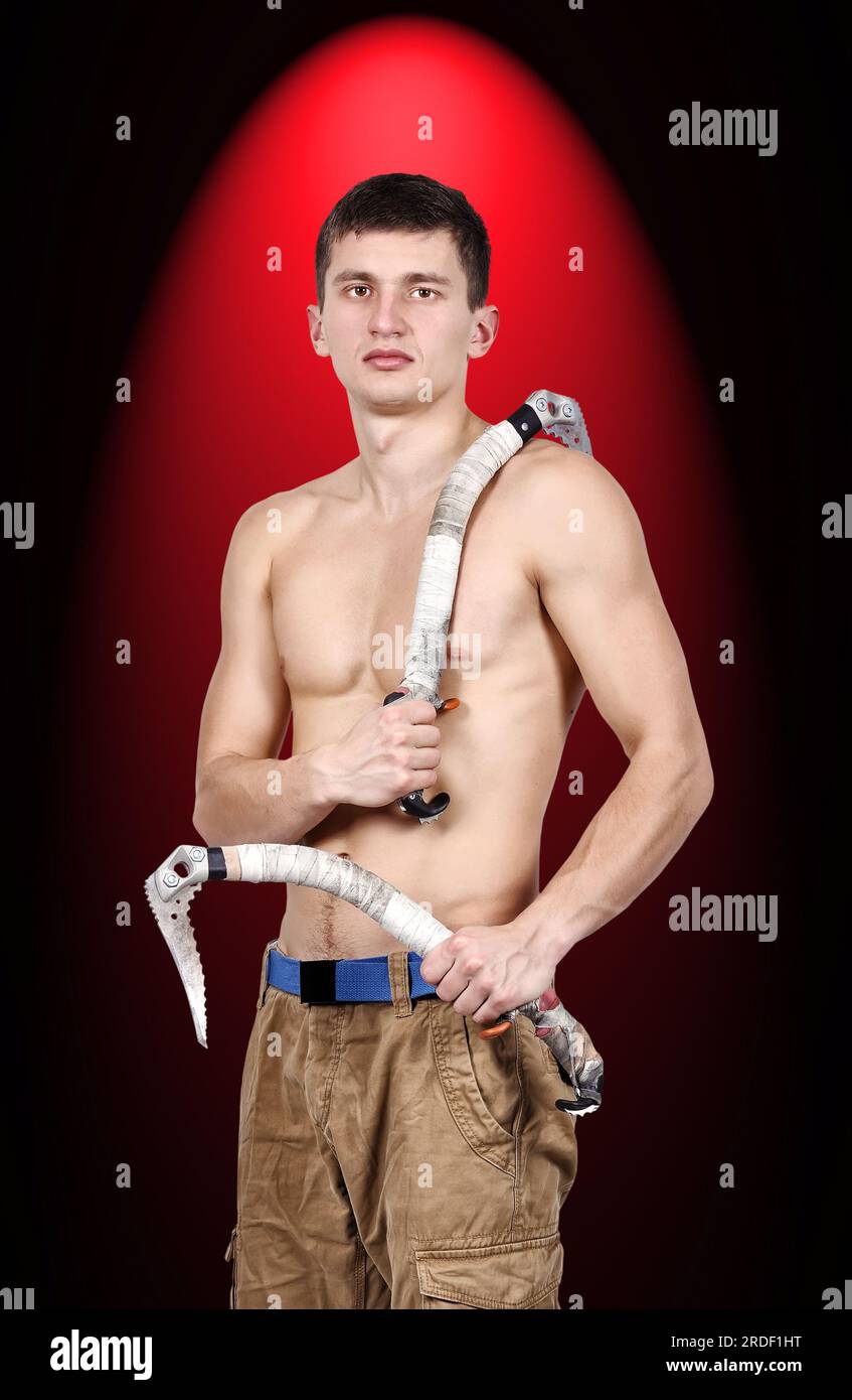 warrior attacking with cold steel arms Stock Photo - Alamy