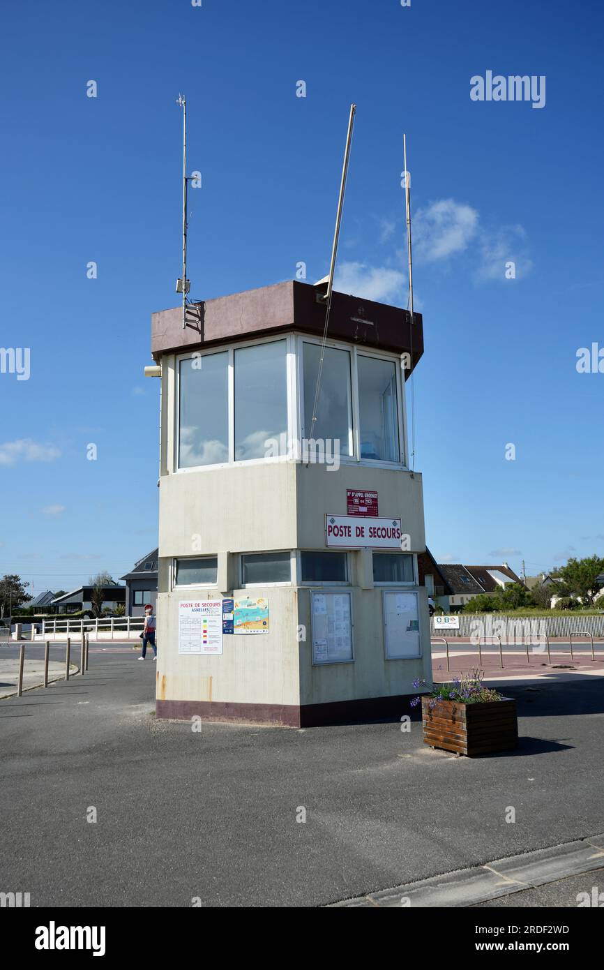 Security Post on Asnelles Beach. White building with blue sky above ...