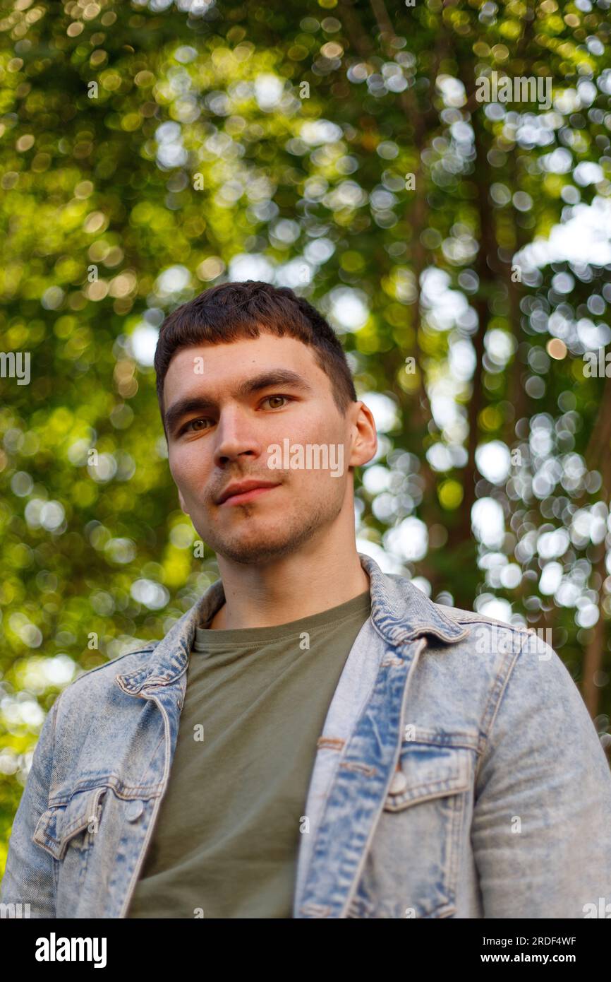 Portrait of man in denim jacket Stock Photo - Alamy