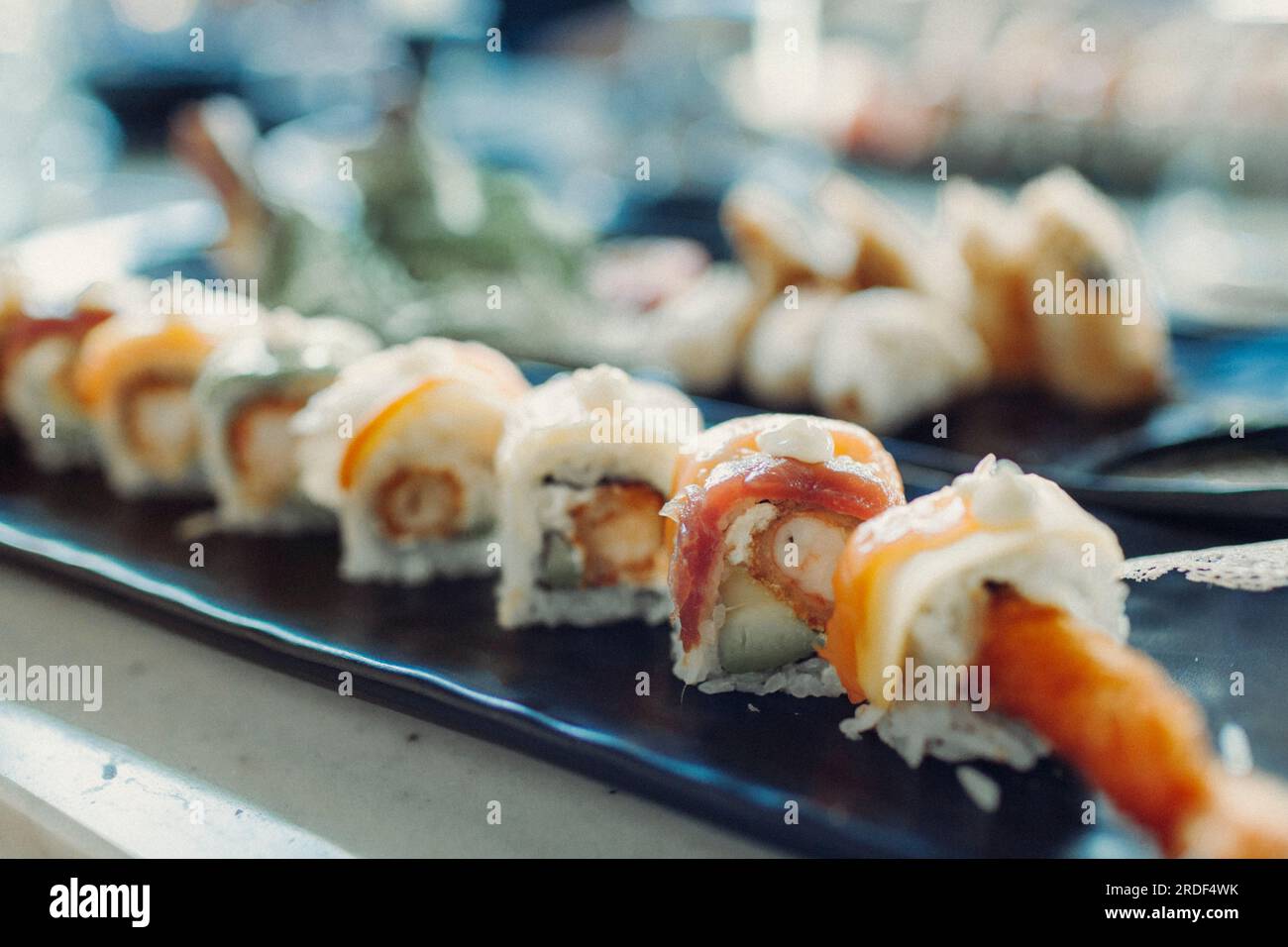 Sushi rolls in black hi-res stock photography and images - Alamy