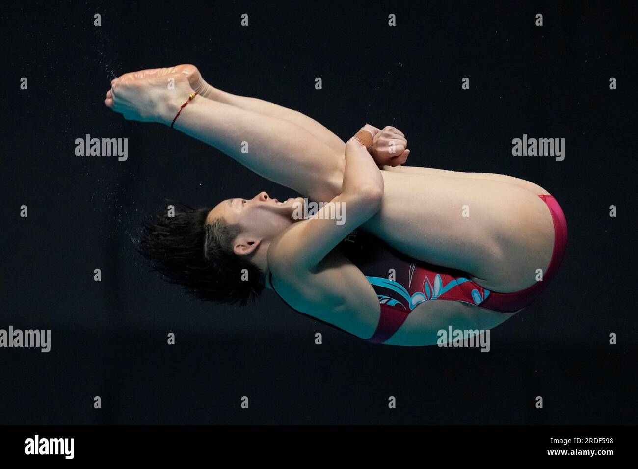 Chen Yiwen of China competes during the women's 3m springboard diving ...