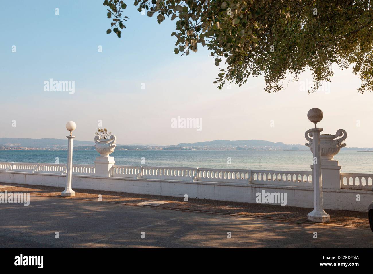 Island of La Toja, Ria de Aurosa, Galicia. Empty walkway and snow-white ...