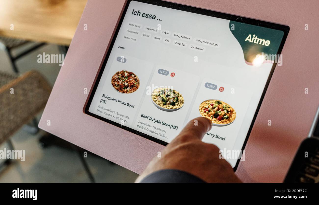 PRODUCTION - 20 July 2023, Schleswig-Holstein, Grömitz: A touch screen ...