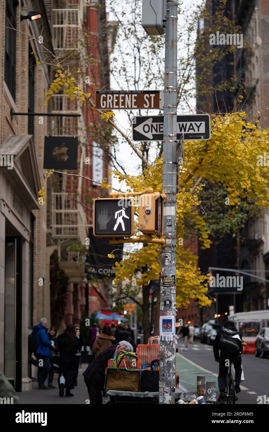 Greene St. street sign in SoHo, New York City saying "walk Stock Photo ...