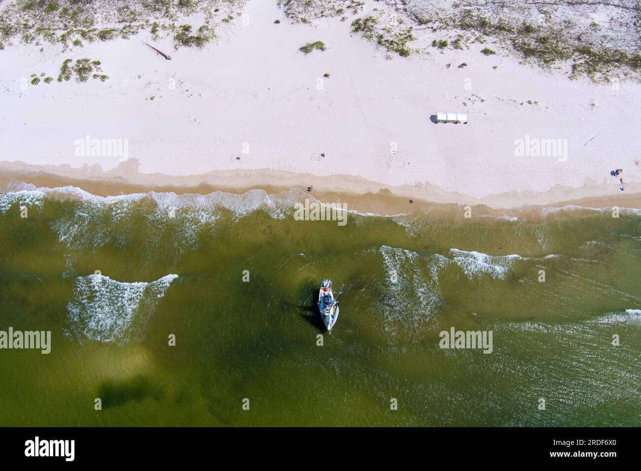 Sailboat on the beach at Fort Morgan, Alabama Stock Photo - Alamy