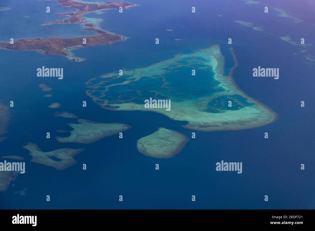 Aerial of little islets of the coast of Viti Levu, Fiji, South Pacific ...
