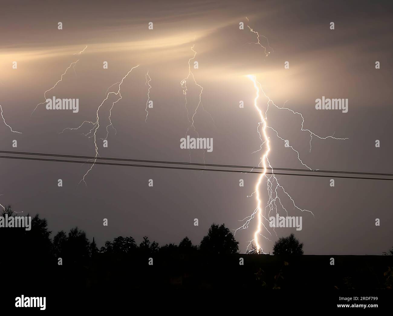Lightning in the sky during a thunderstorm Stock Photo - Alamy
