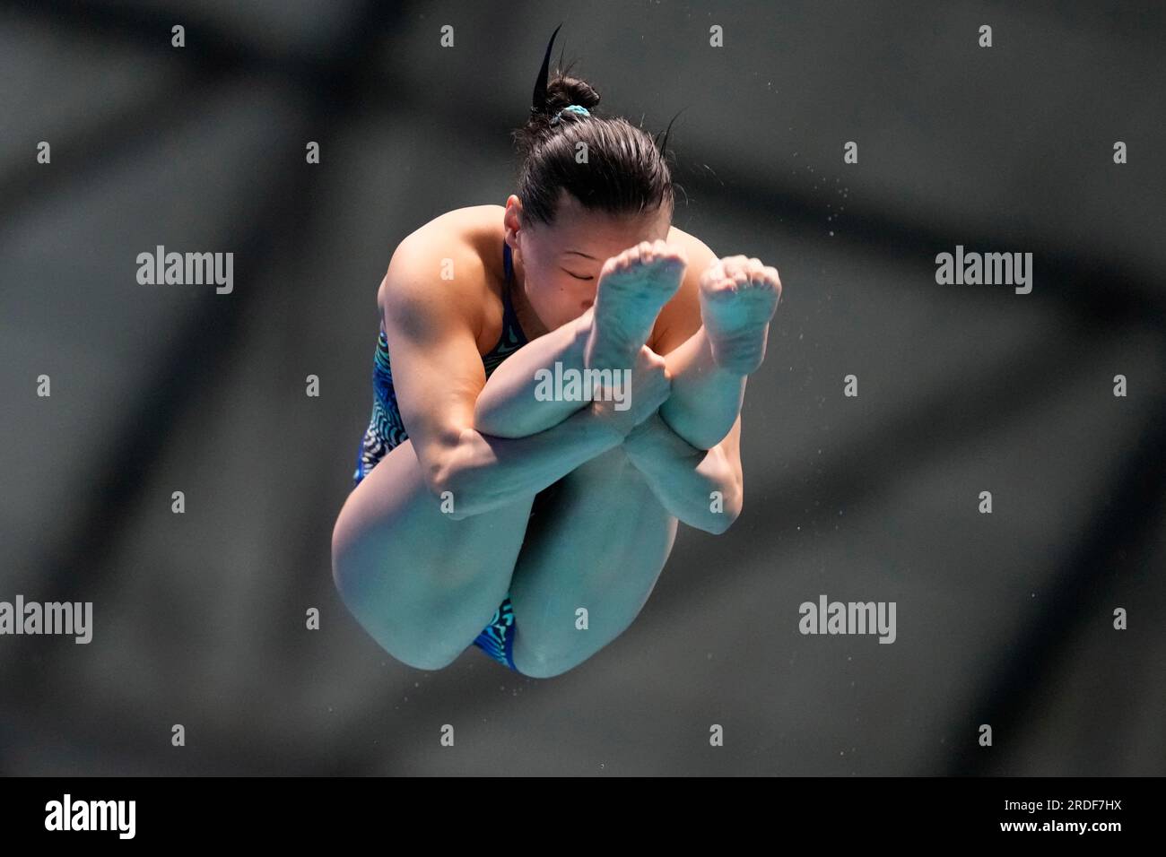 Sayaka Mikami of Japan competes during the women's 3m springboard ...
