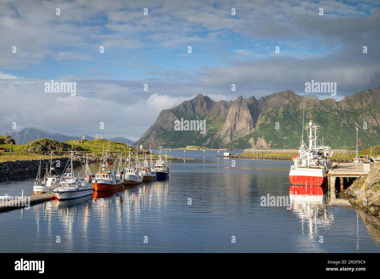 Boats in the harbour, fishing village Hovden, Langoya island ...