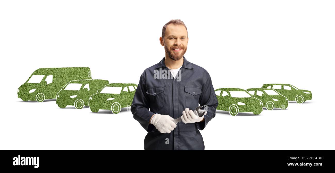 Auto mechanic posing in front of vehicles made of grass isolated on ...