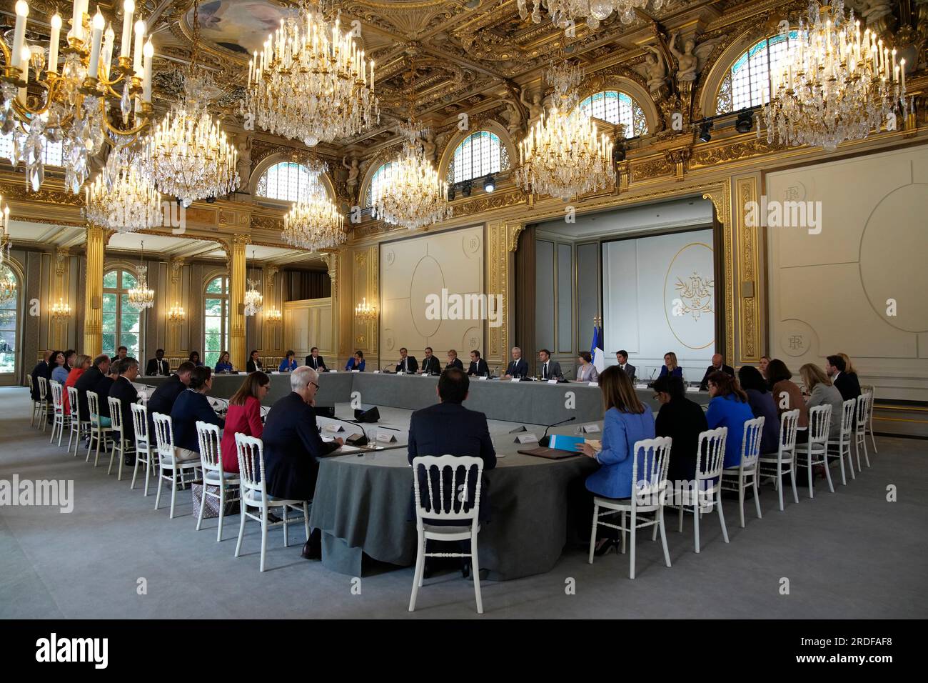 French President Emmanuel Macron, center right behind, chair a cabinet ...