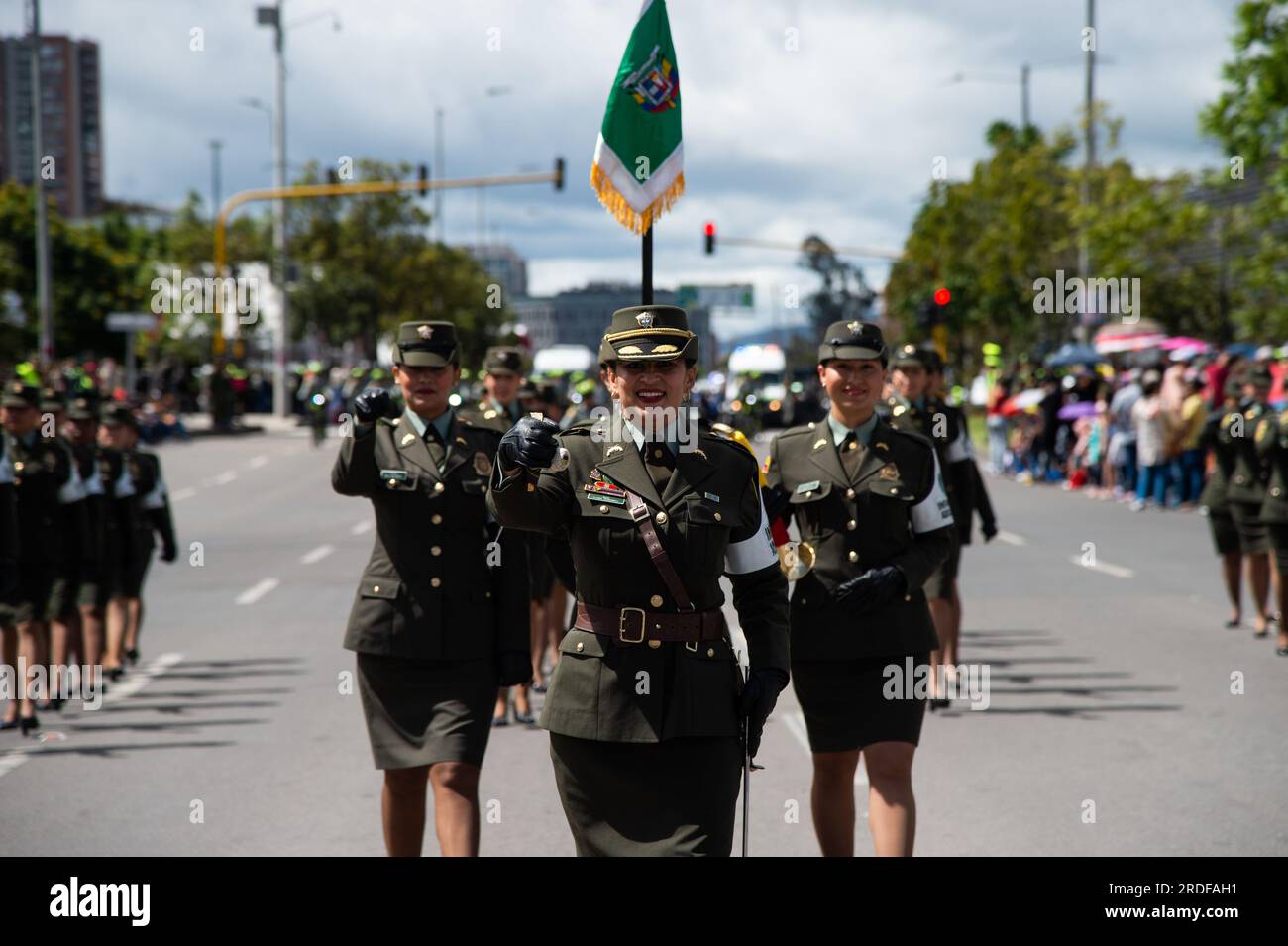 Colombian police officials take part during the military parade for the ...