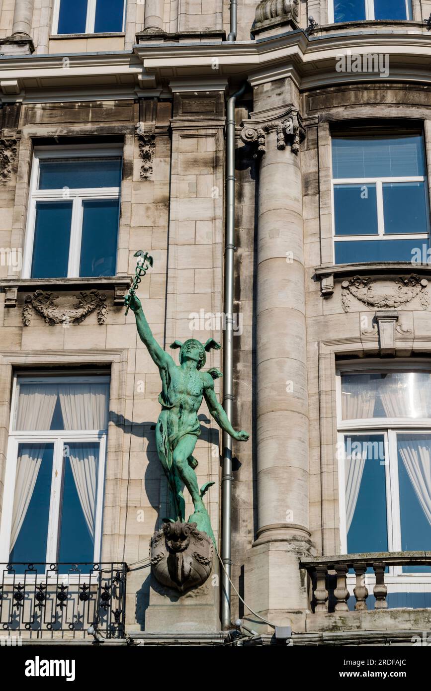 Historical building with a sculpture along the waterfront in the old ...