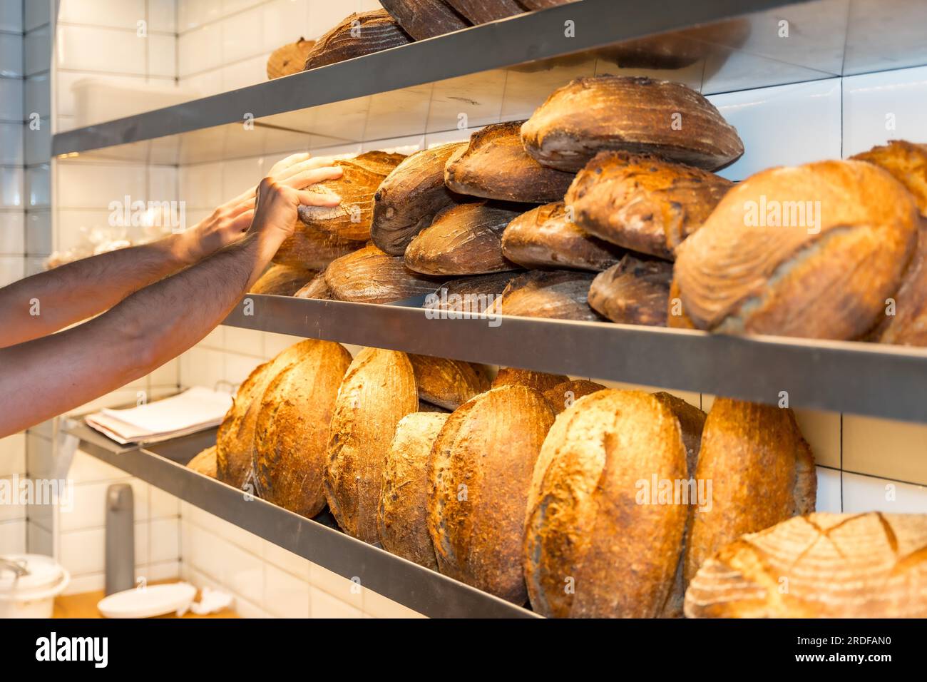 Male employee baker of bakery in the workshop workshop of artisan ...