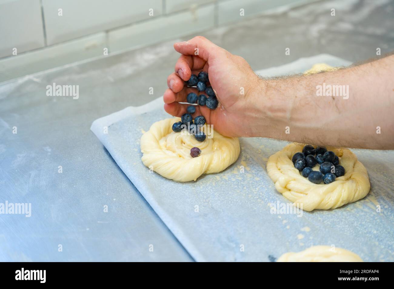 Baker of bakery in the workshop workshop of artisan bakery preparing ...
