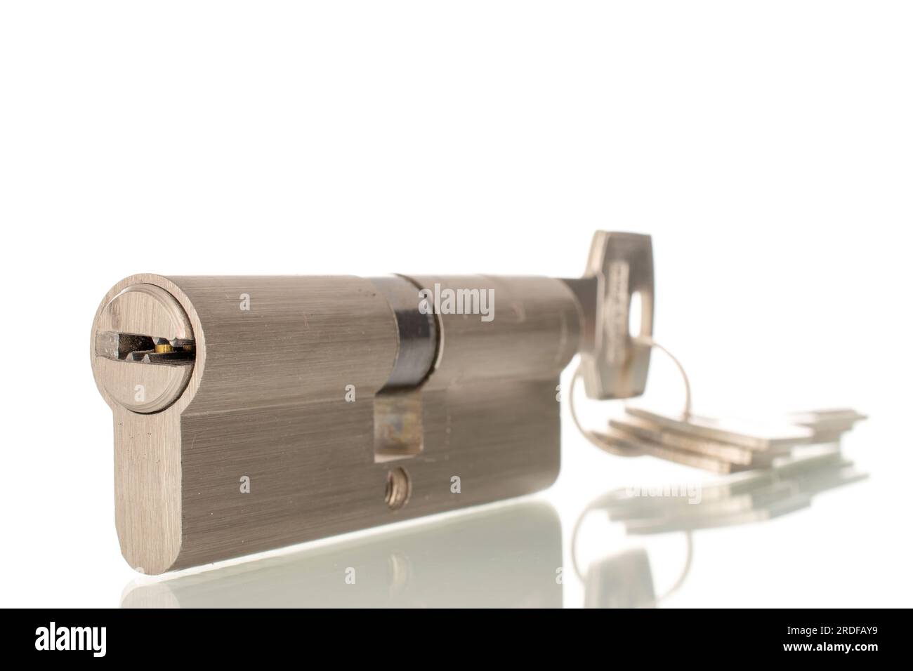 One core metal lock with key, macro, isolated on white background Stock ...