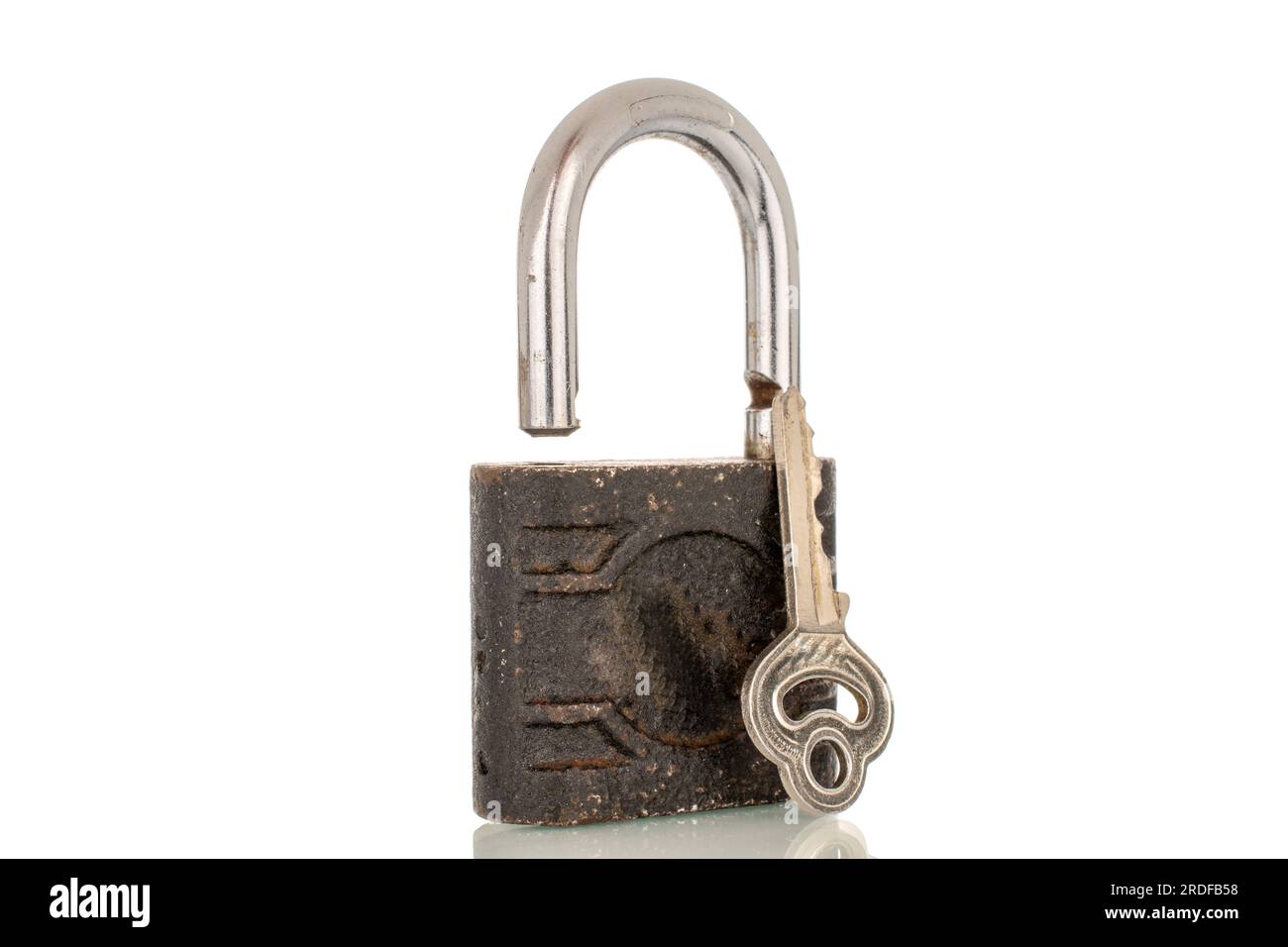 One metal lock with key, macro, isolated on white background Stock ...