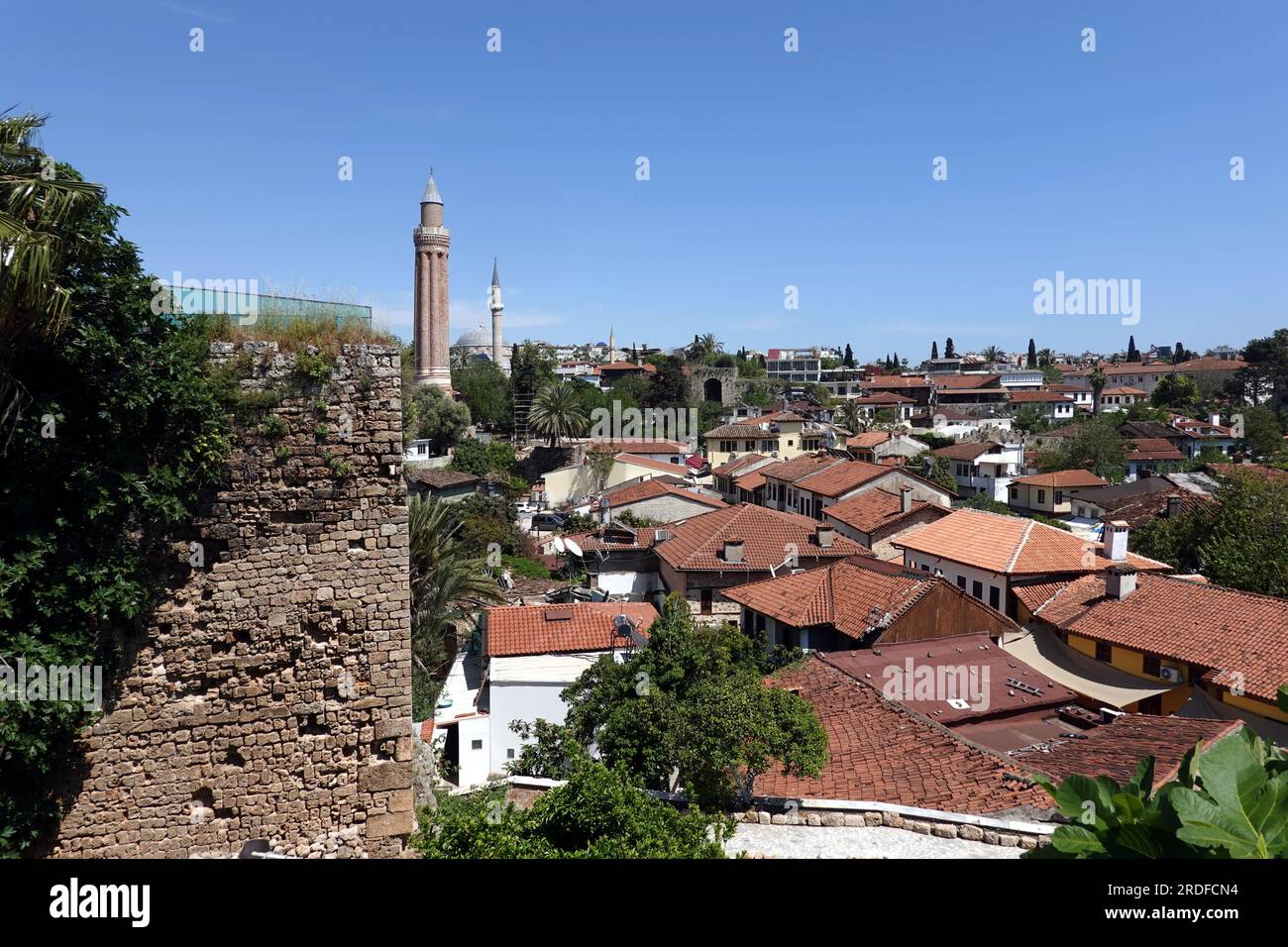 Panoramic view of the tiled roofs of dense standing houses of the ...