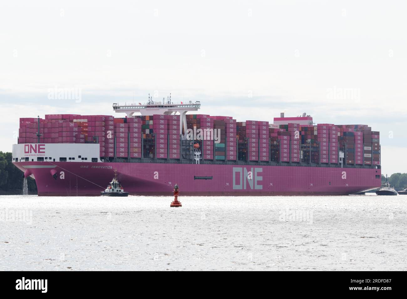 Pink container freighter One Innovation of the shipping company Ocean ...