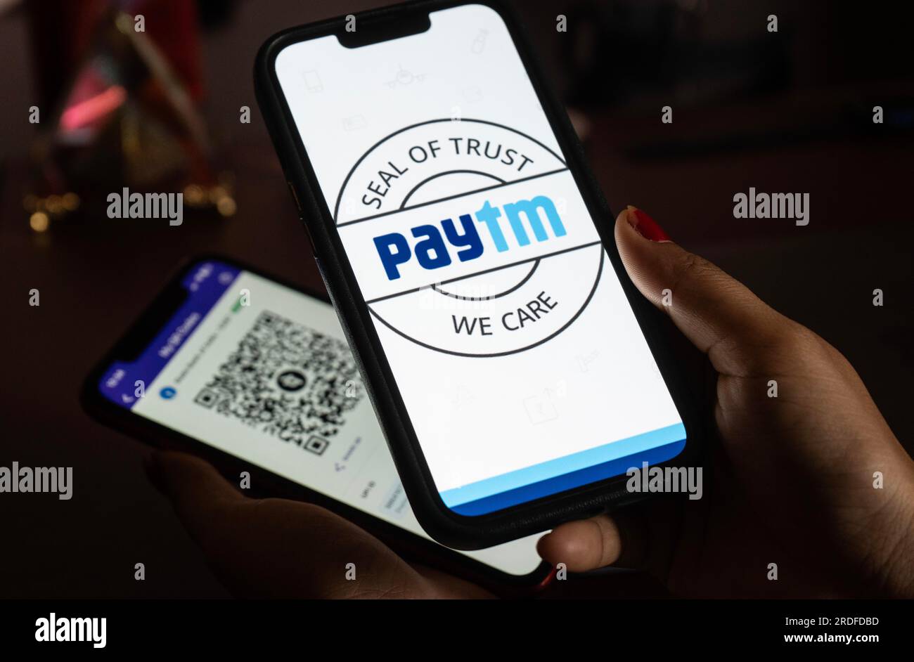 In this photo illustration, the Paytm logo and PhonePe QR code, is seen ...