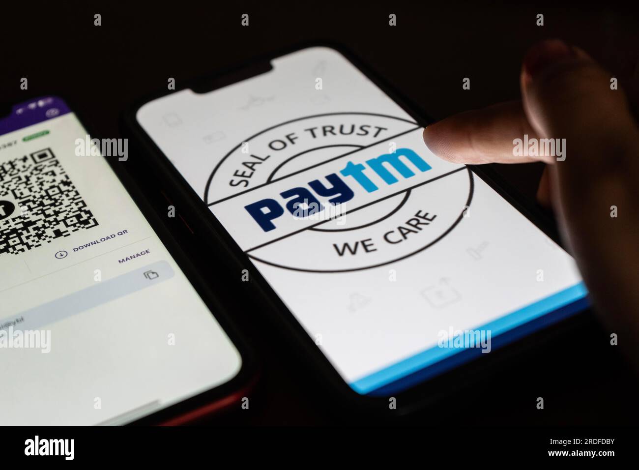 In this photo illustration, the Paytm logo and PhonePe QR code, is seen ...