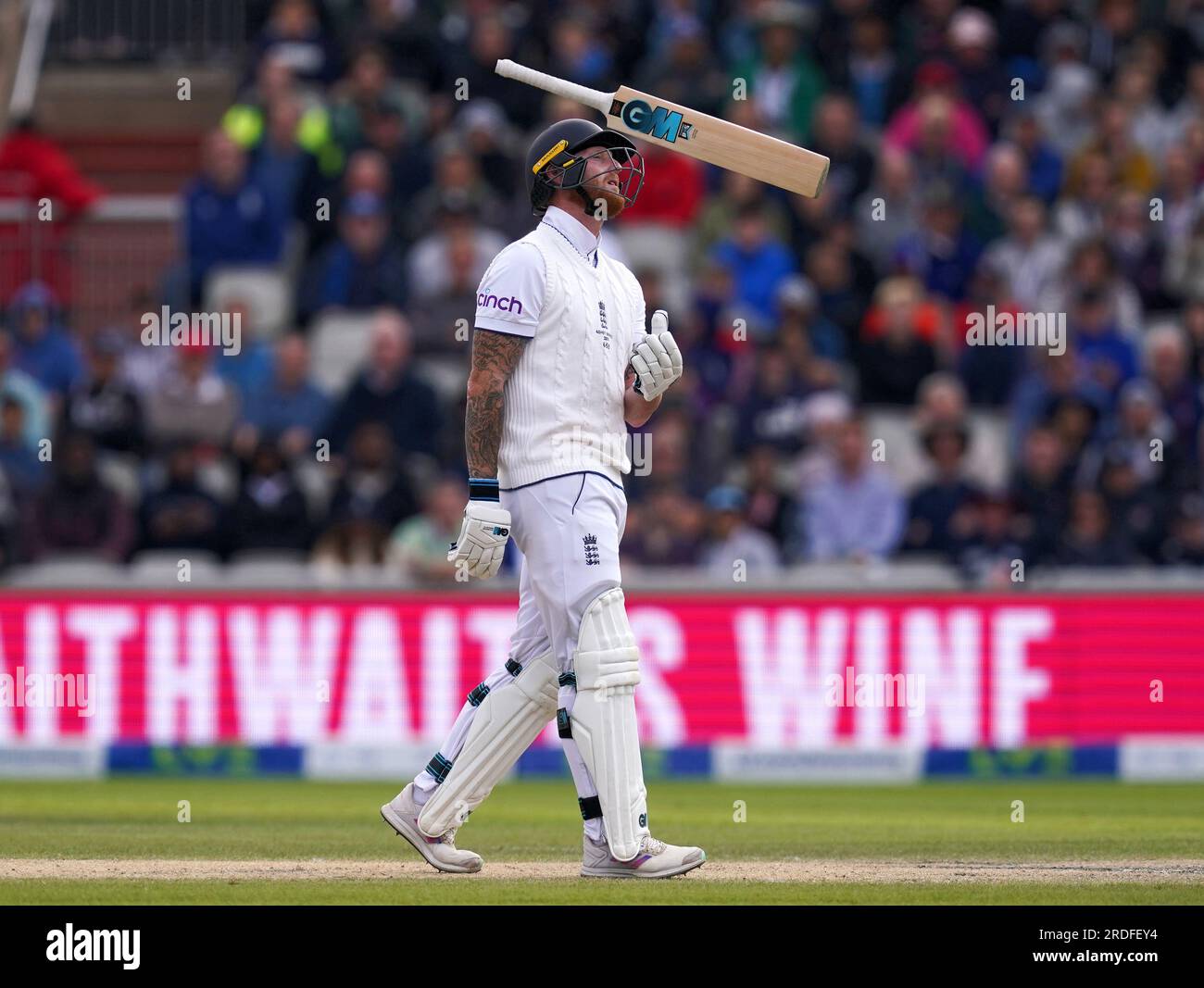 England's Ben Stokes reacts by throwing his bat after being bowled out ...