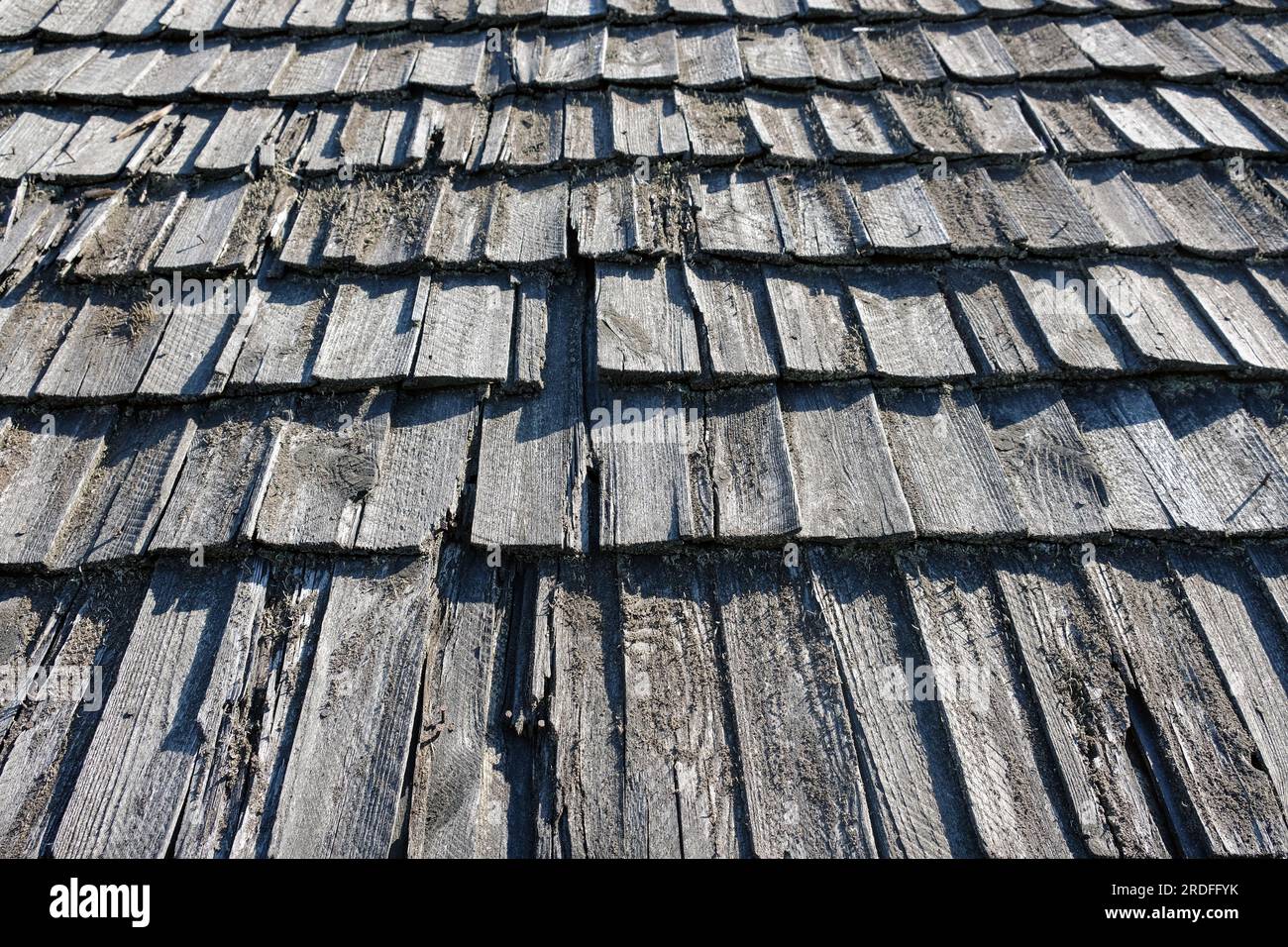 Wooden gray roof shingles. Wood weathered roofing pattern detail. Old ...