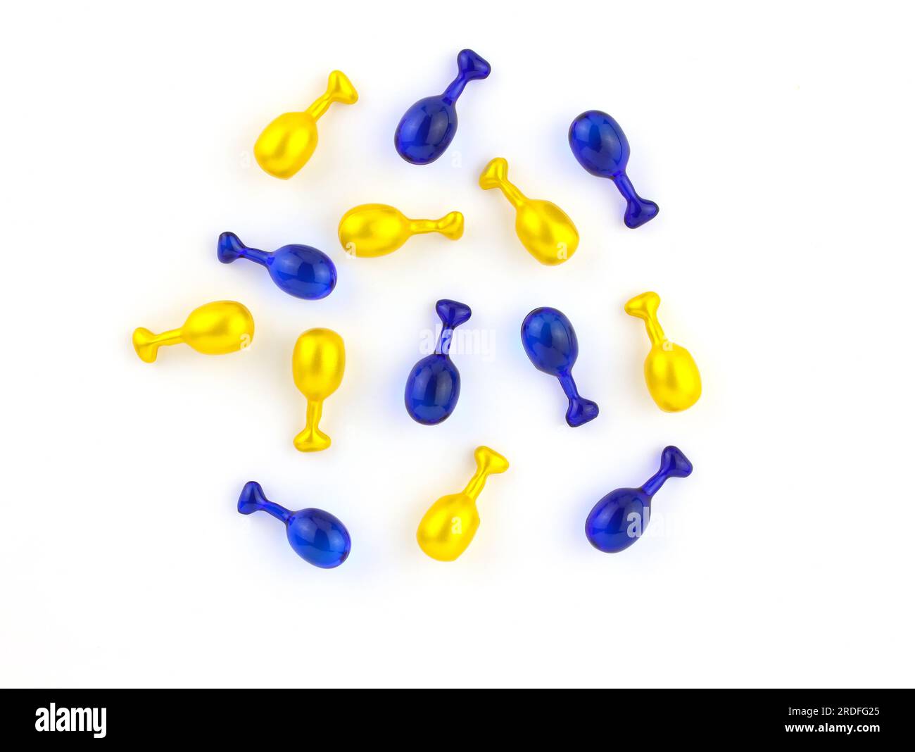 Capsules for face and body care close-up on a white background. Serum ...