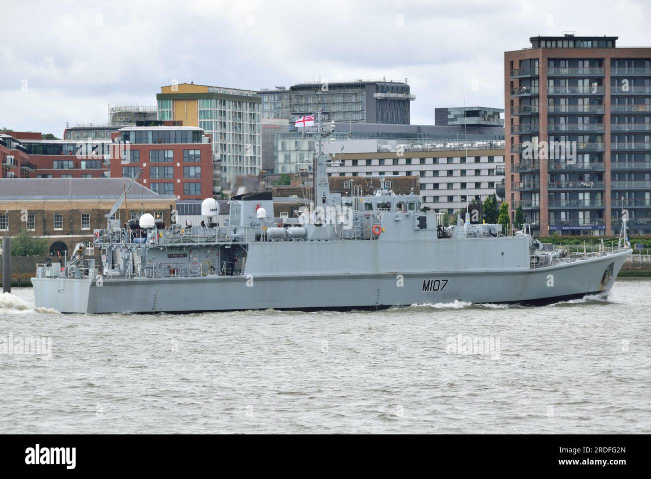 Royal Navy minesweeper HMS Pembroke M107 on the River Thames in London ...