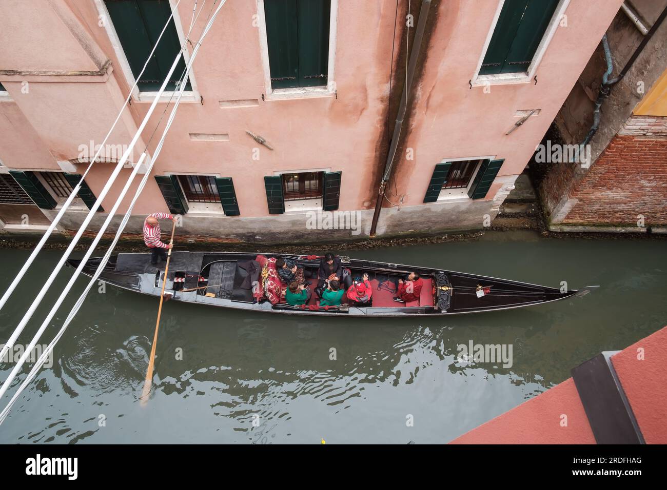 Venice, Italy - April 27, 2019 : View of a Gondola in a small chanel in ...