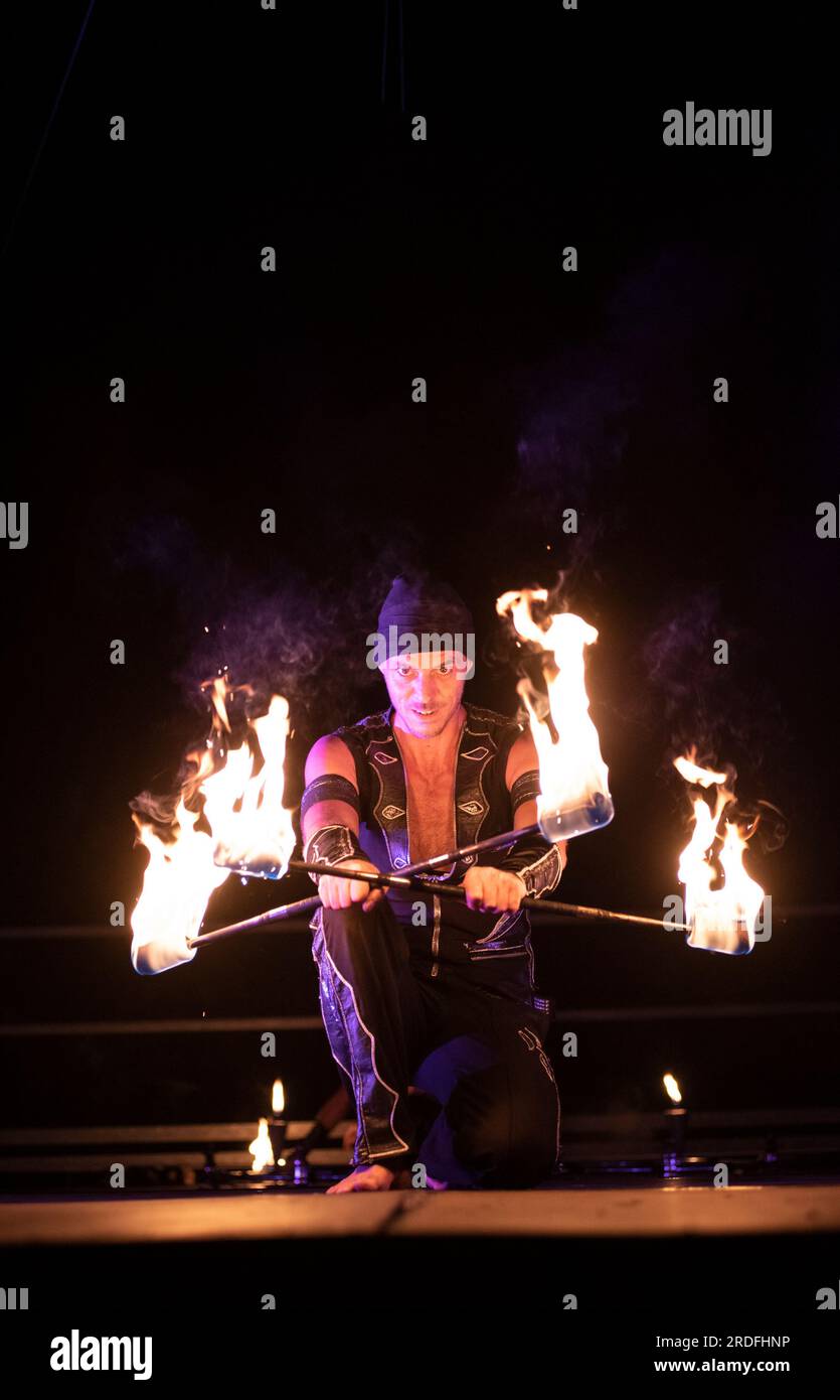 Dance of flying fire. Artist man performing at MERCANTIA International ...