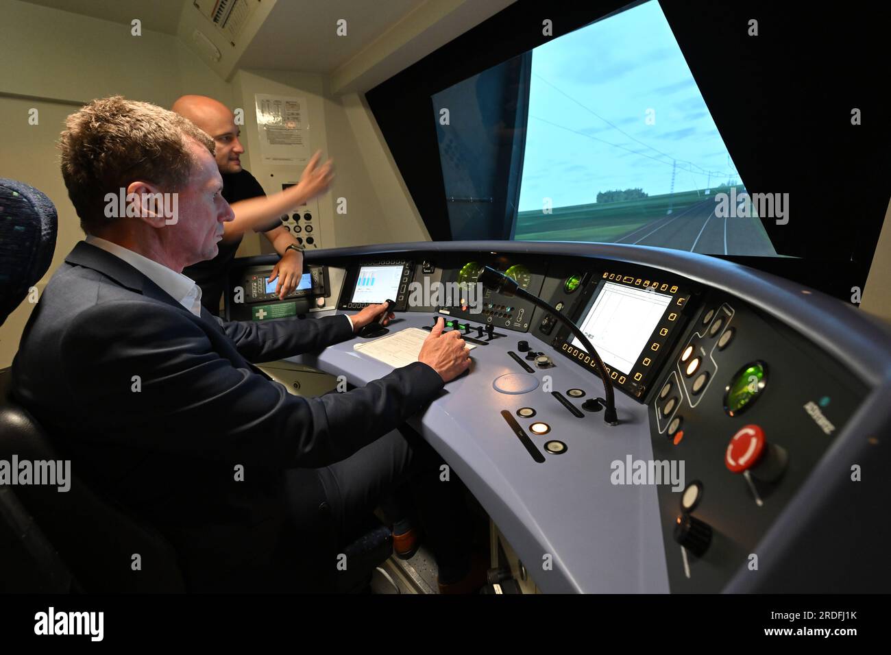 Munich, Germany. 21st July, 2023. A trainer teaches during a press ...