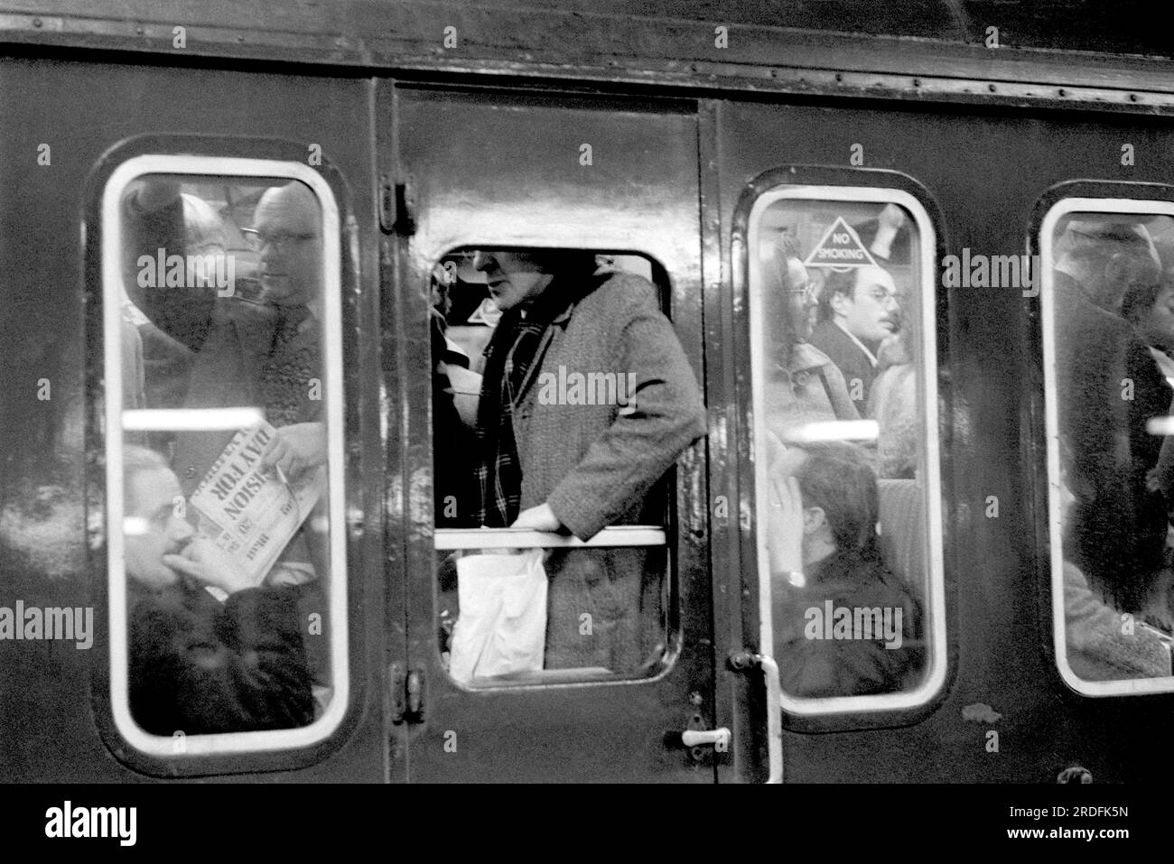 80-0128 Crowded commuter train at London Euston, January 1980 Euston ...