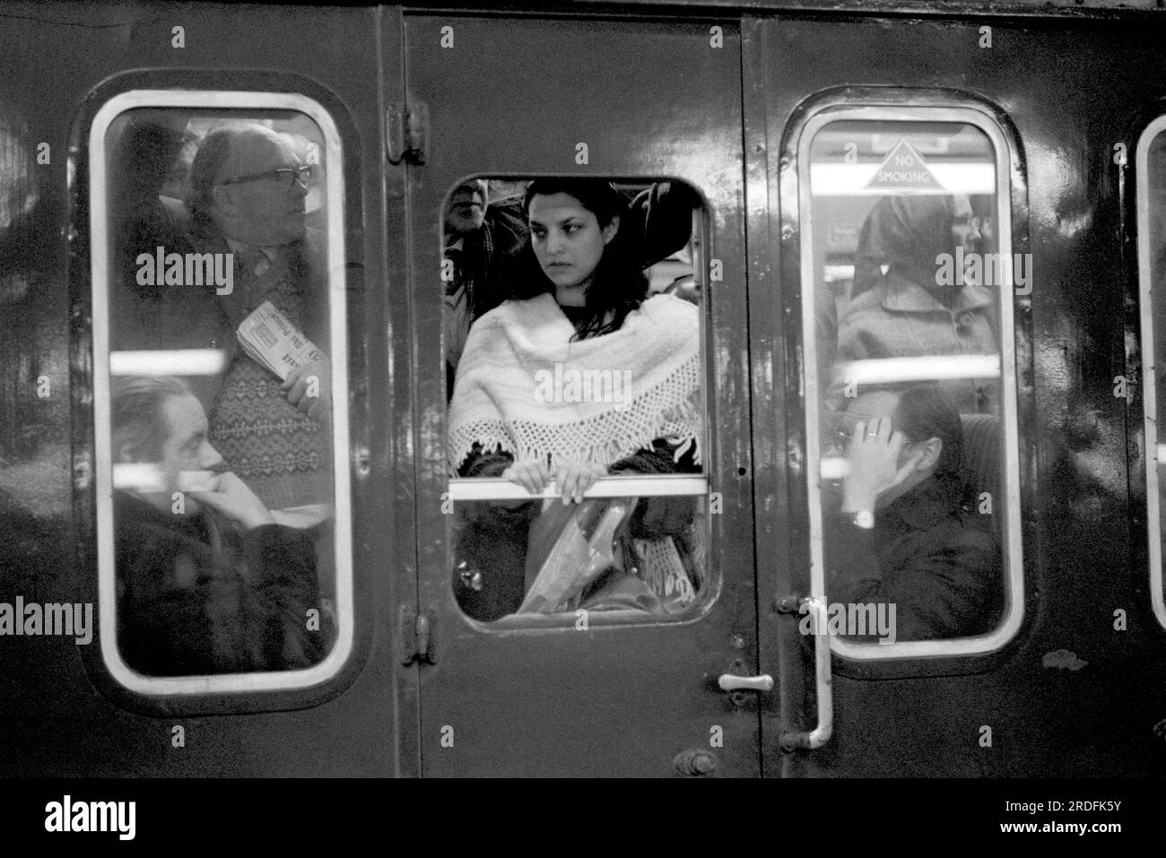 80-0129 Crowded commuter train at London Euston, January 1980 Euston ...