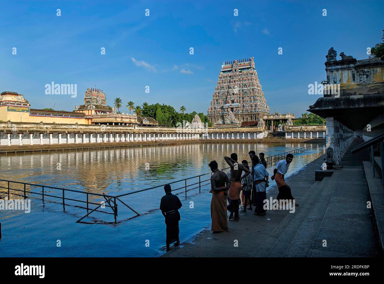 The Sivaganga tank with north gopuram tower in Thillai Nataraja temple ...