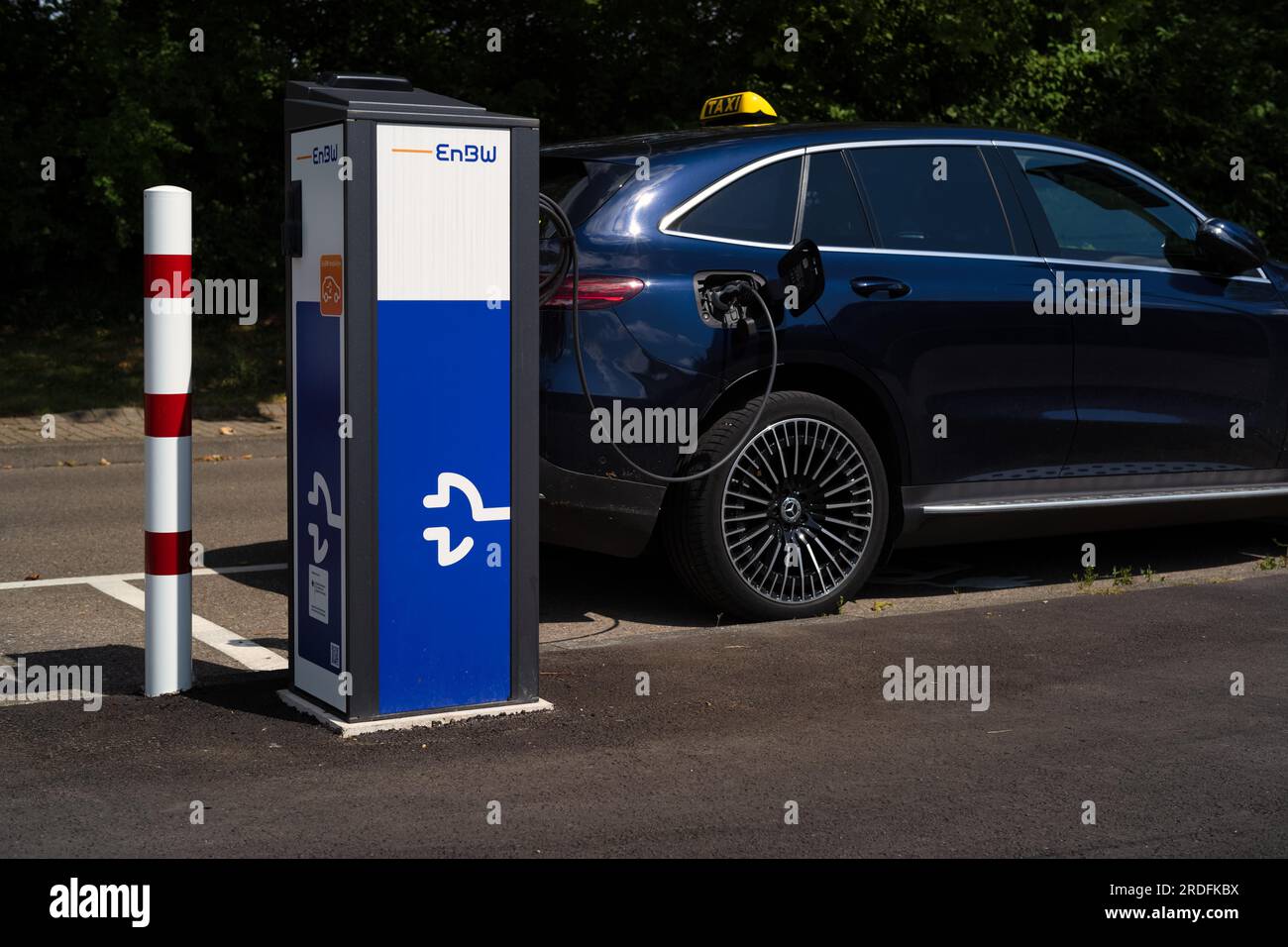 Mercedes-Benz E-Taxi at charging station EnBW for electric cars ...