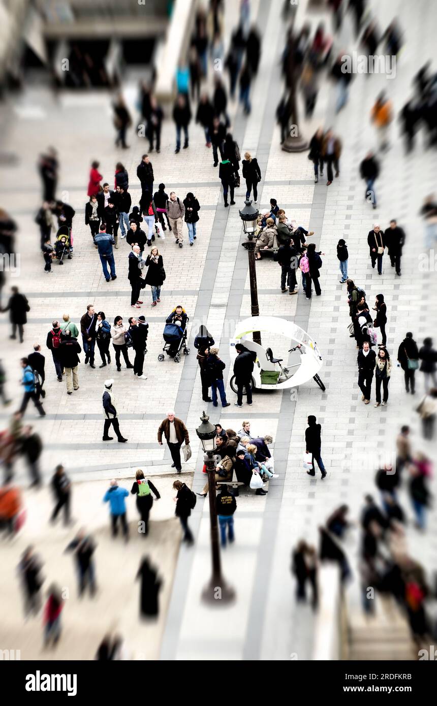 Tilt-shift crowd of people on street Stock Photo - Alamy