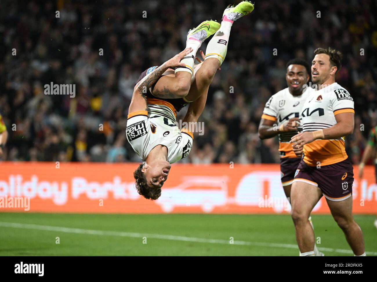 Sunshine Coast, Australia. 21st July, 2023. Reece Walsh (left) of the Broncos does a backflip to ...