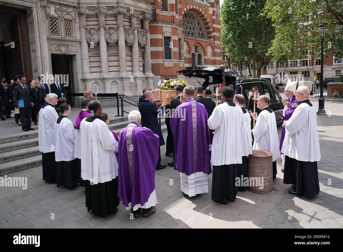The coffin of Grace O'Malley-Kumar is carried from her funeral at ...