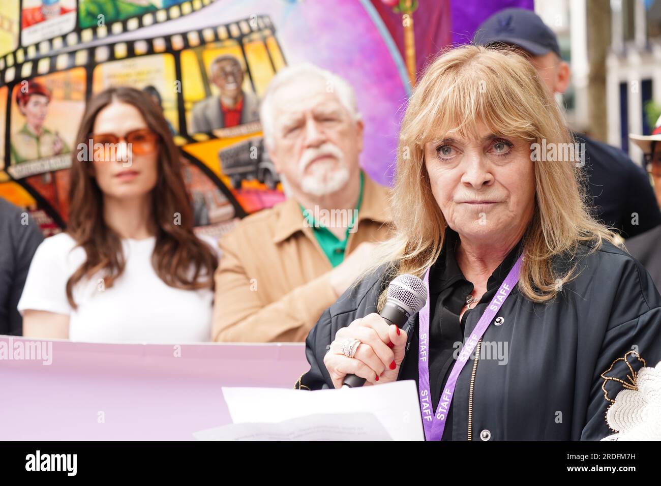 Hayley Atwell and Brian Cox look on Lynda Rooke speaks during a protest ...