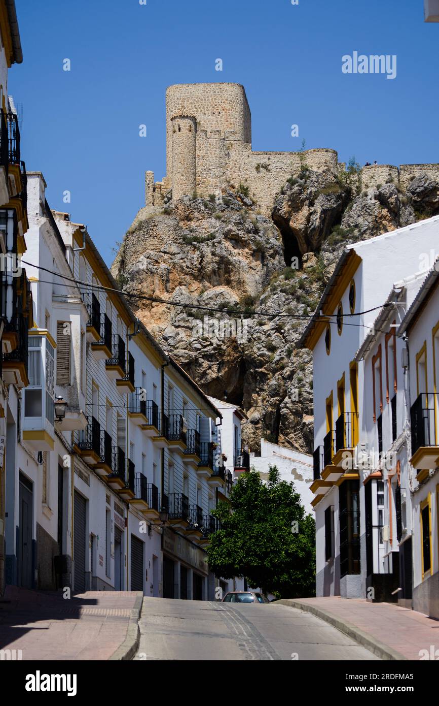 Olvera, Cádiz province, Spain. View along Calle Llana with Castillo de ...
