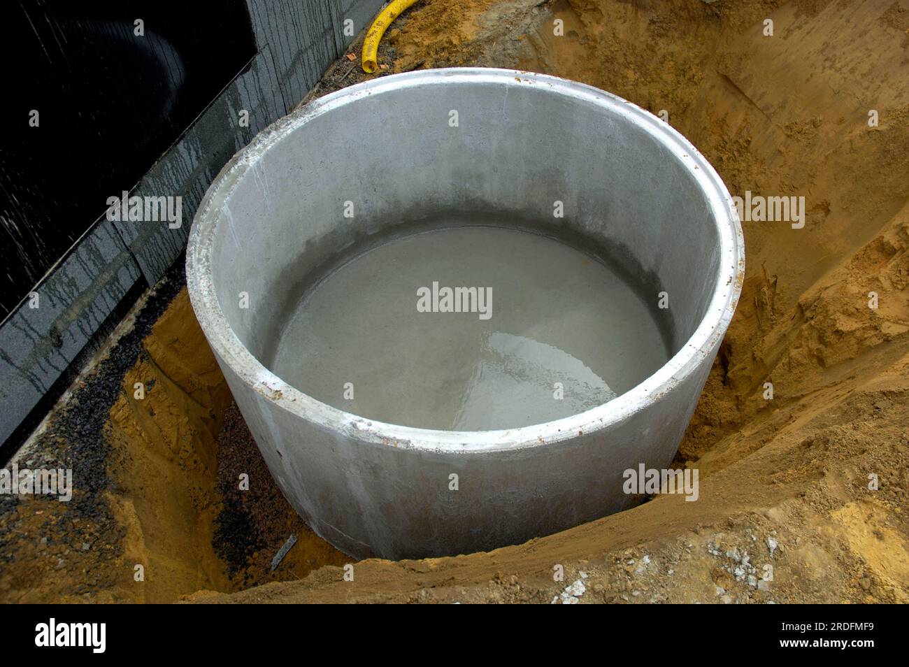 Installation of a rainwater cistern, North Rhine-Westphalia, Germany ...