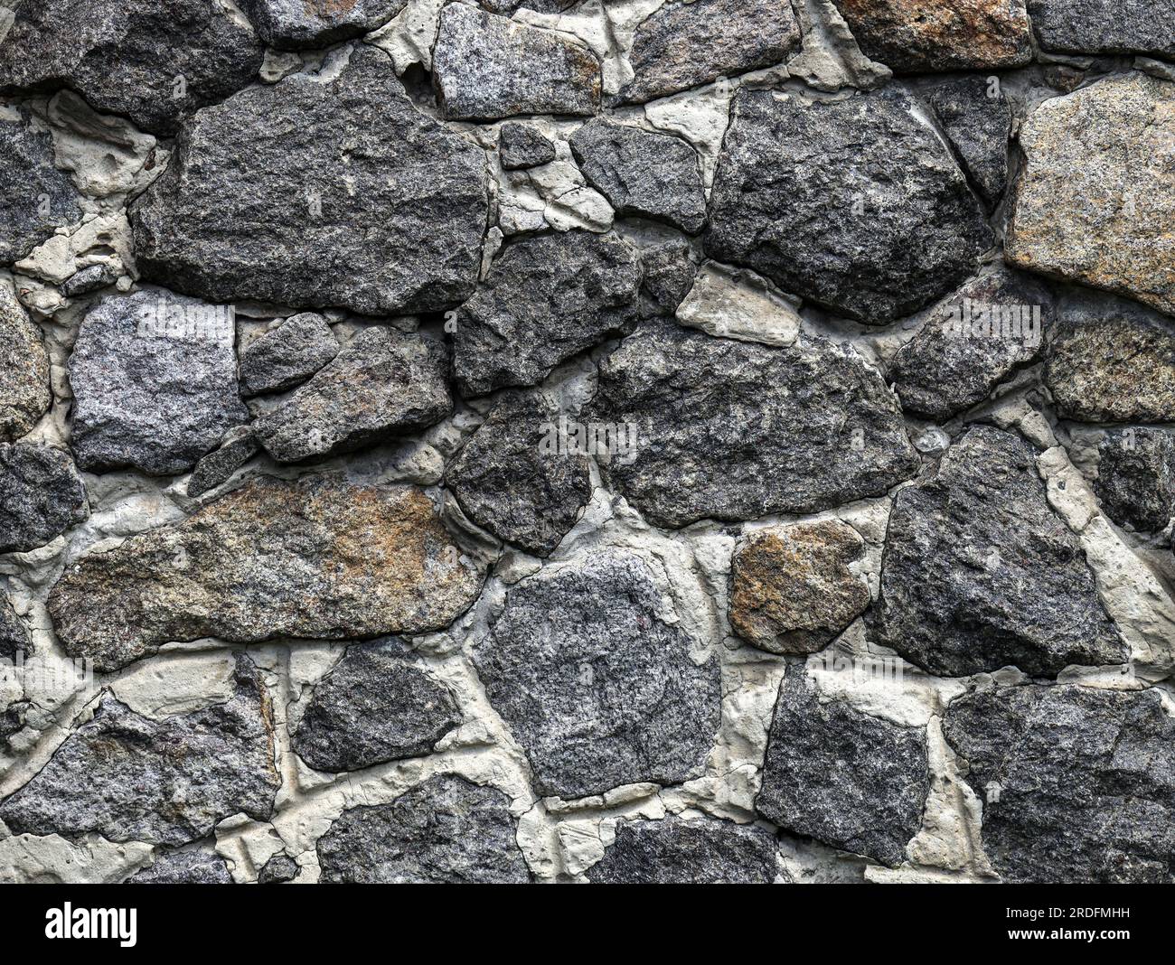 Gray stone wall texture. Wide panoramic rock pattern. Natural masonry surface, brick frame. Grey ...