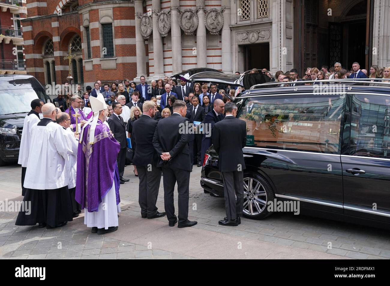 The coffin of Grace O'Malley-Kumar is carried from her funeral at ...
