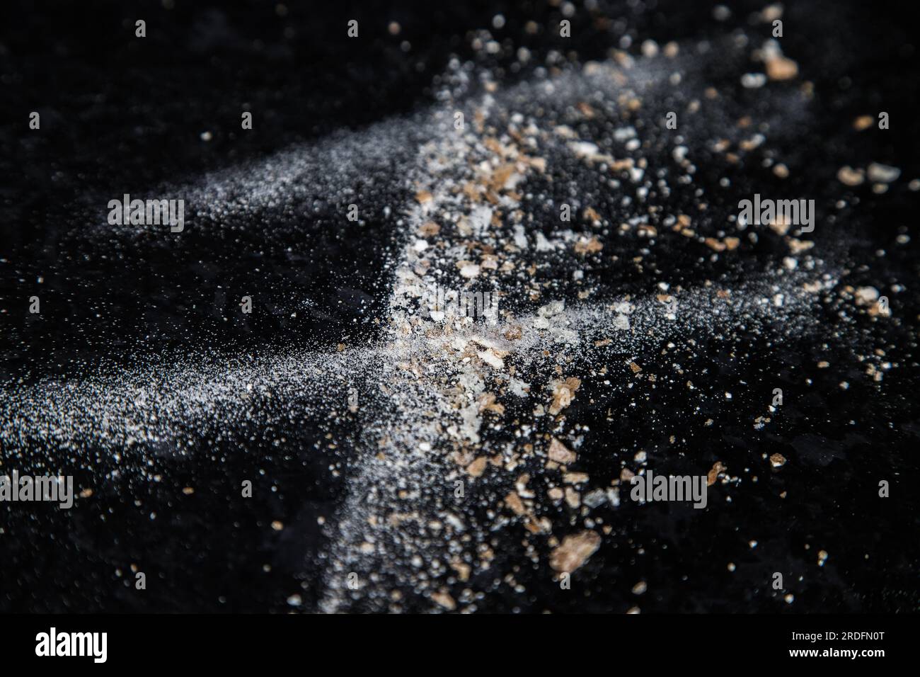 Abstract image made with flour and breadcrumbs on dark background ...