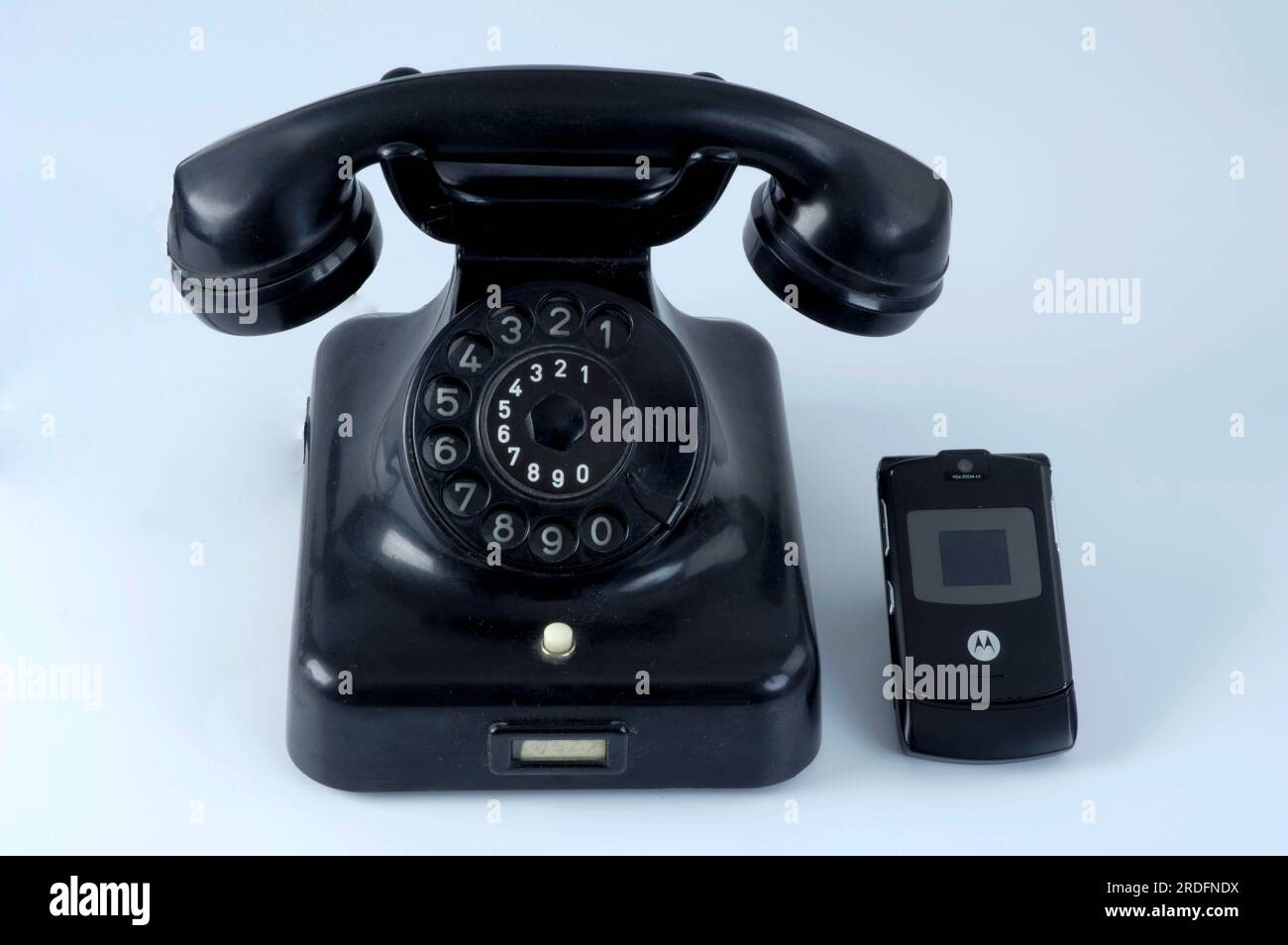 Historical telephone W48 and mobile phone, telecommunication, cutout, object Stock Photo - Alamy