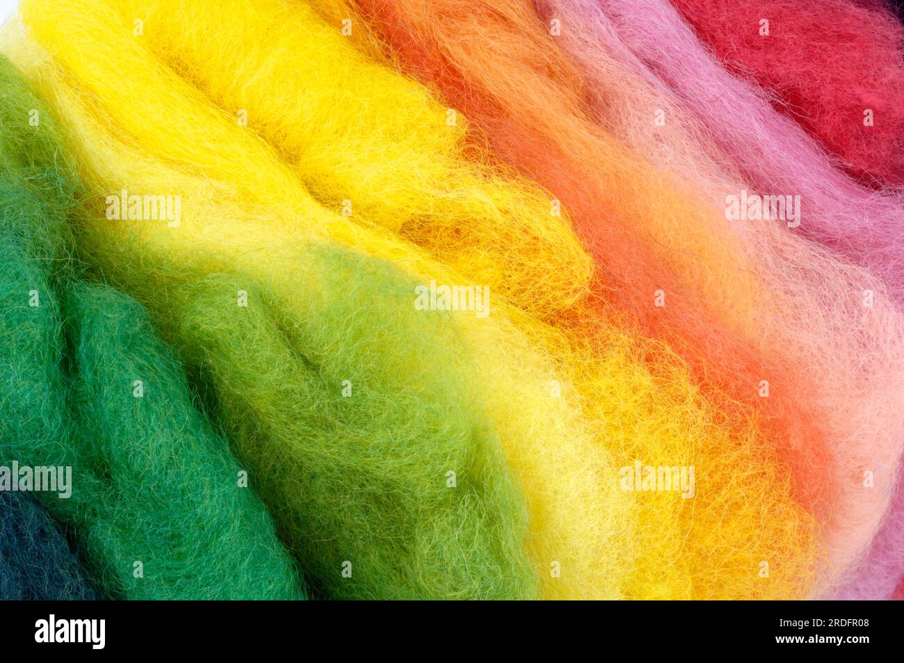 Wool for felting, dyed with natural colours Stock Photo - Alamy