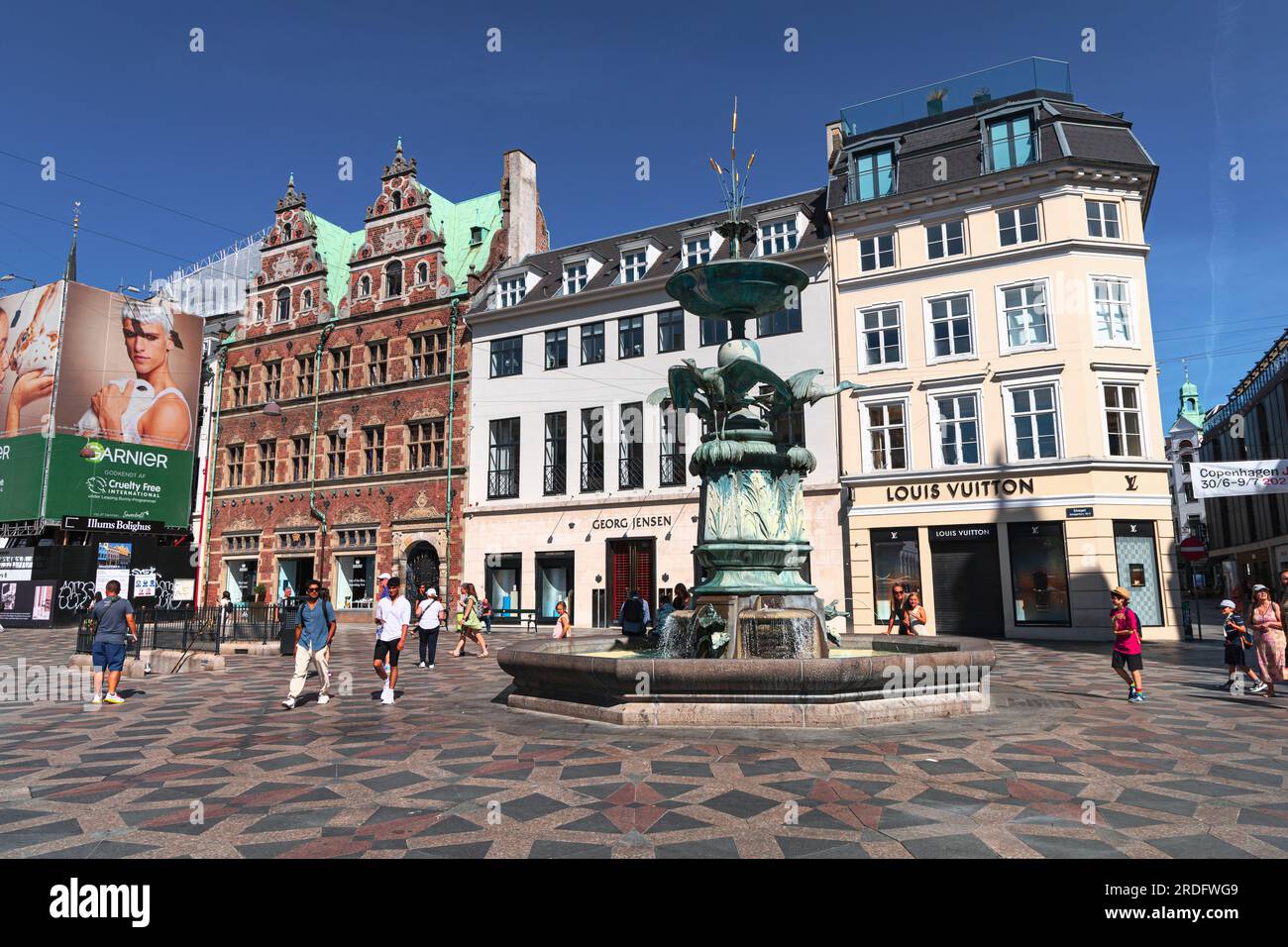 The famous Stork fountain and traditional old houses on the street in ...