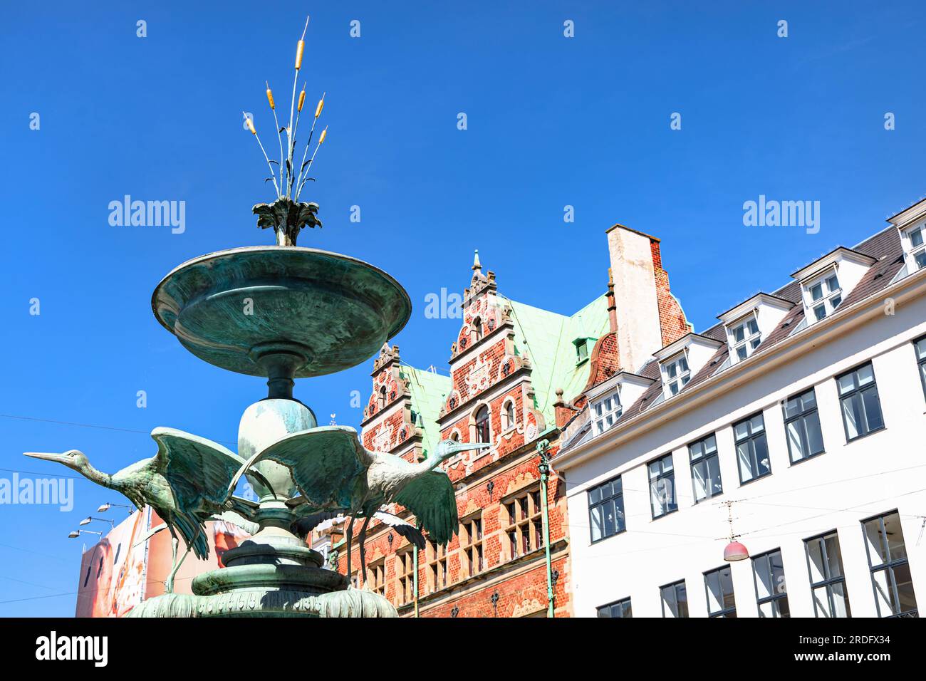 The famous Stork fountain and traditional old houses on the street in ...
