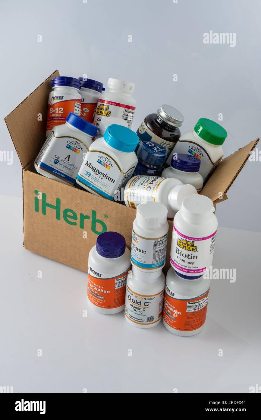 Vitamins, minerals and micronutrients from iHerb box. Lots of different ...